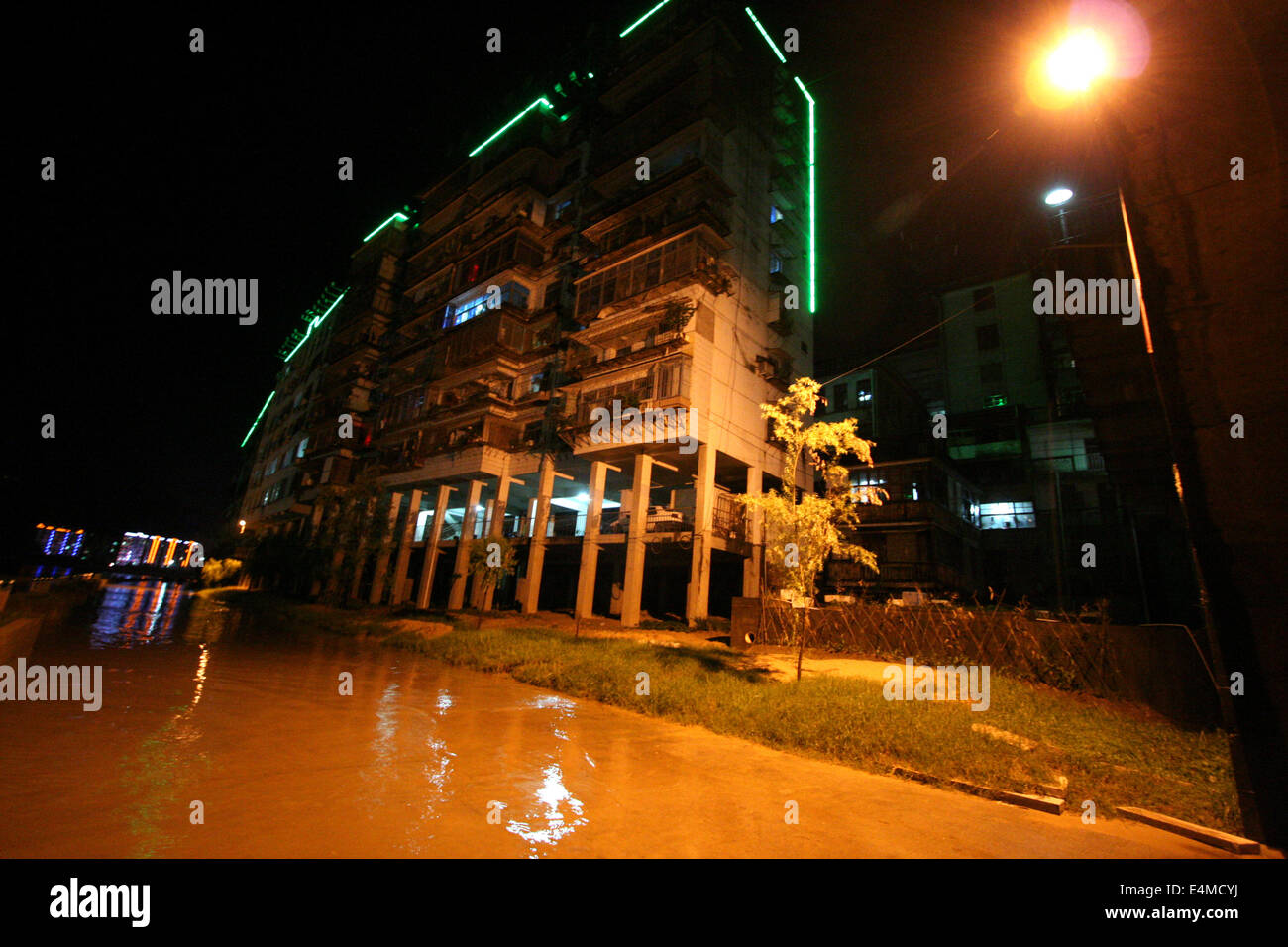 Nanping, China's Fujian Province. 14th July, 2014. A road is flooded ...