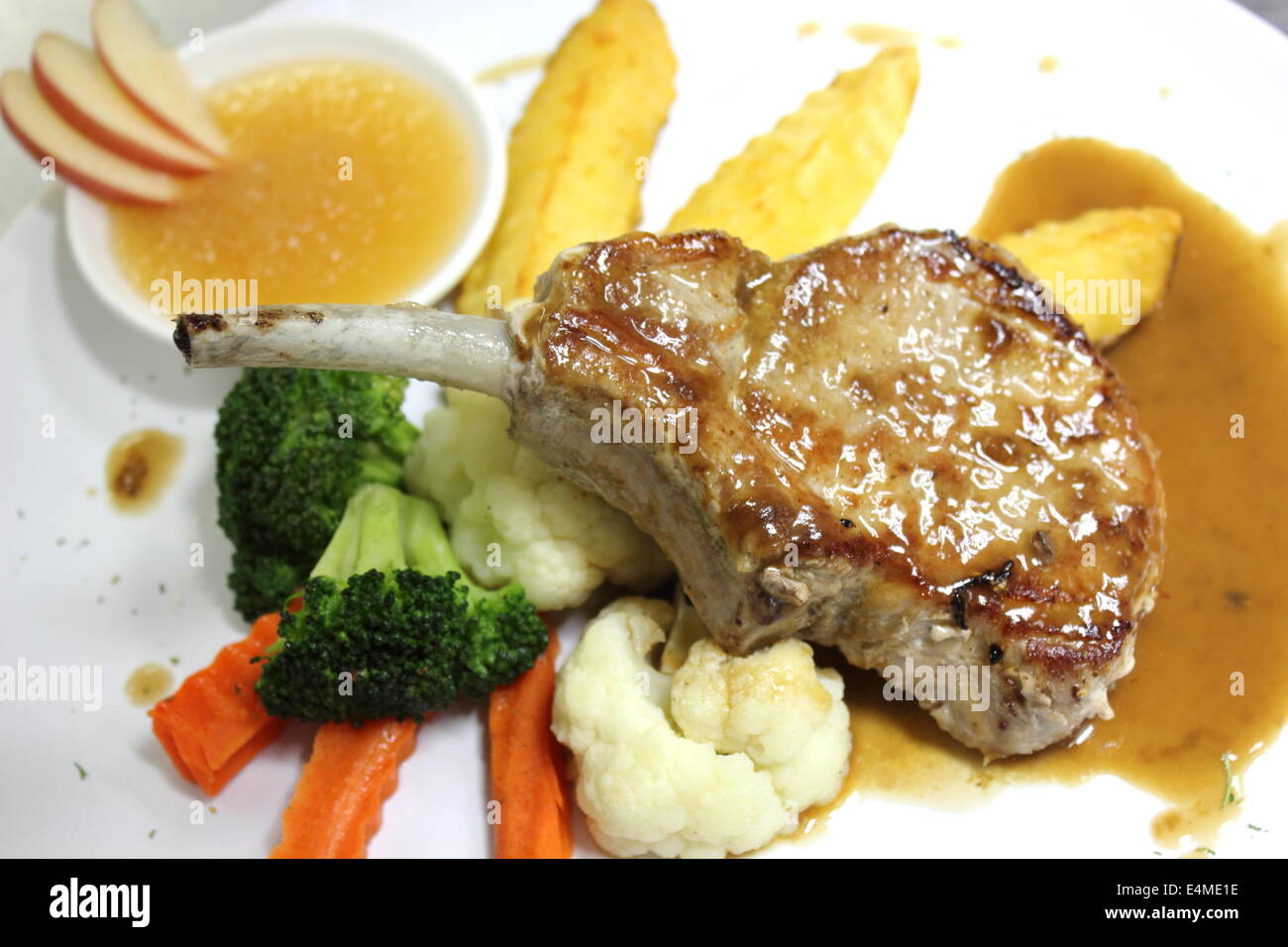 Gourmet Main Entree Course Grilled Lamb steak with spicy Pepper sauce ...