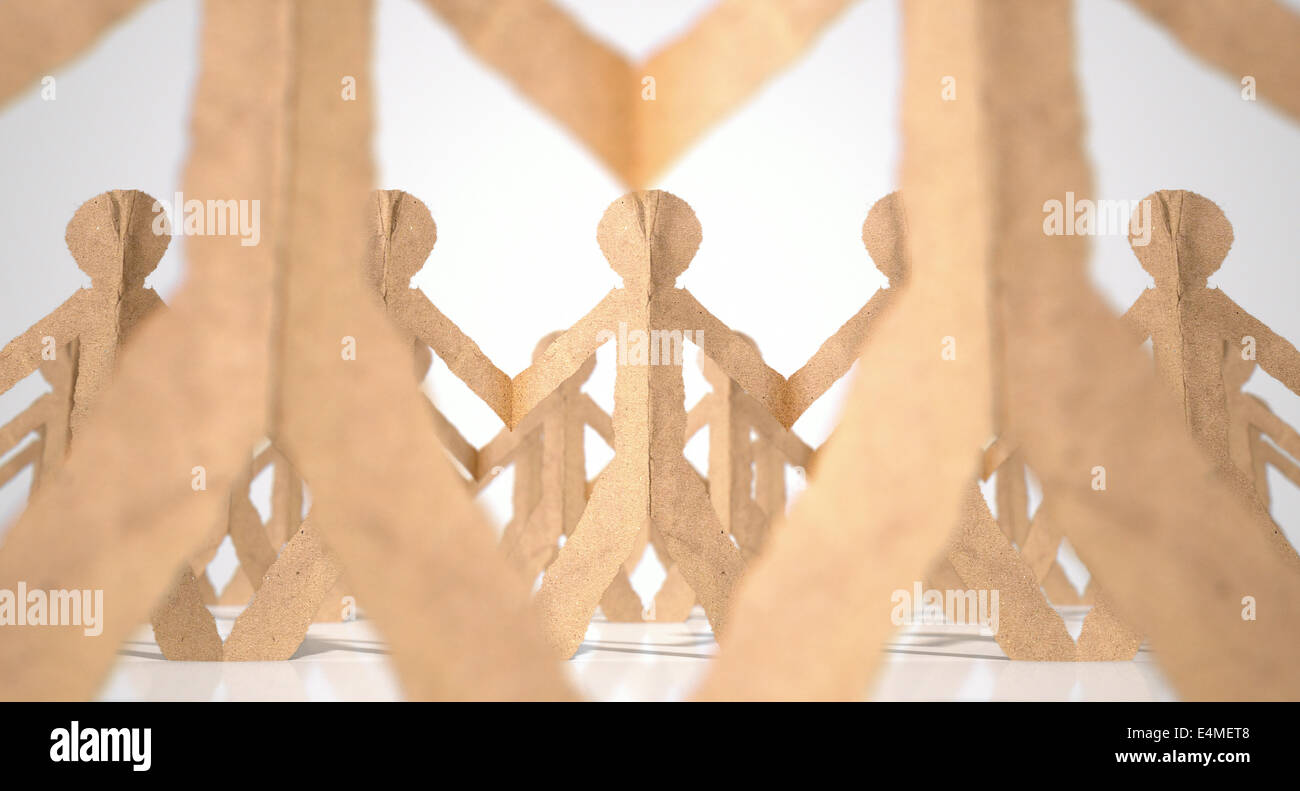 A collection of long rows of brown cardboard cutout men on an isolated ...