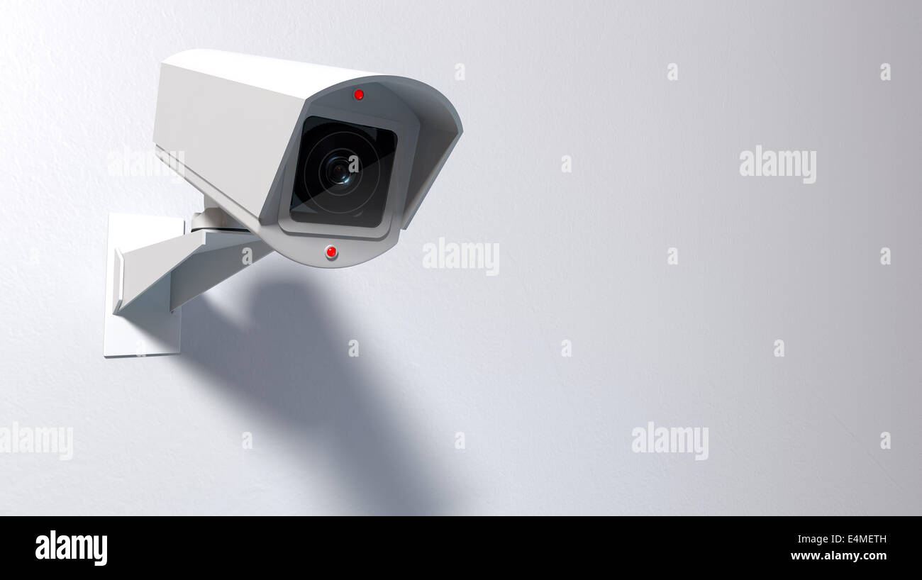 A white wireless surveillance camera with illuminated lights mounted on ...