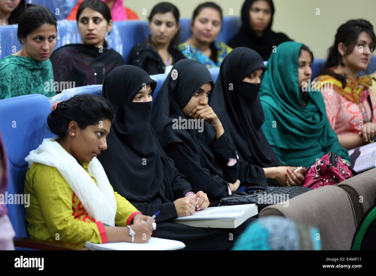 female students during a lecture at the female campus of the Islamic ...