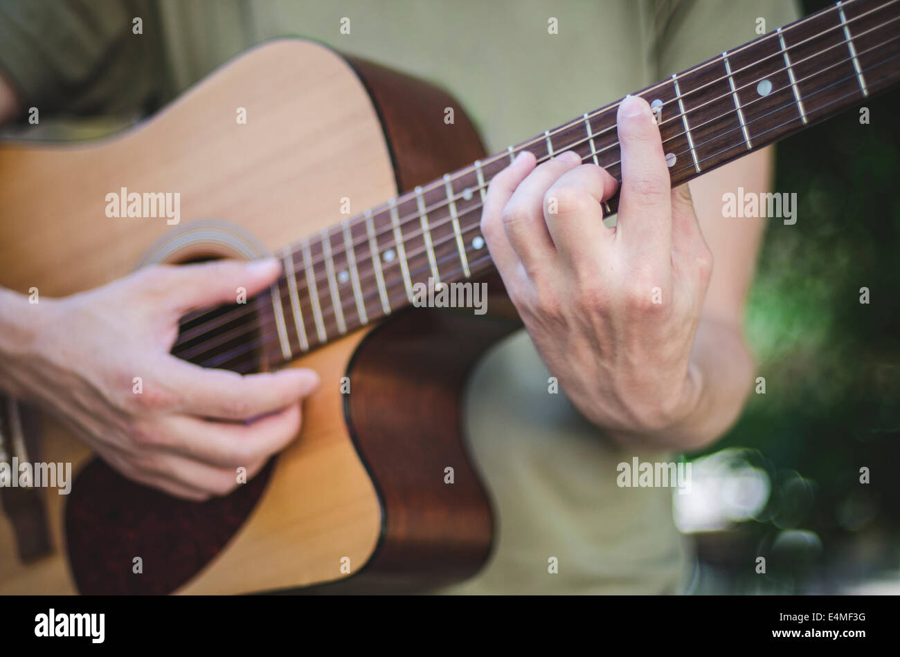 Close up musician playing acoustic hi-res stock photography and images ...