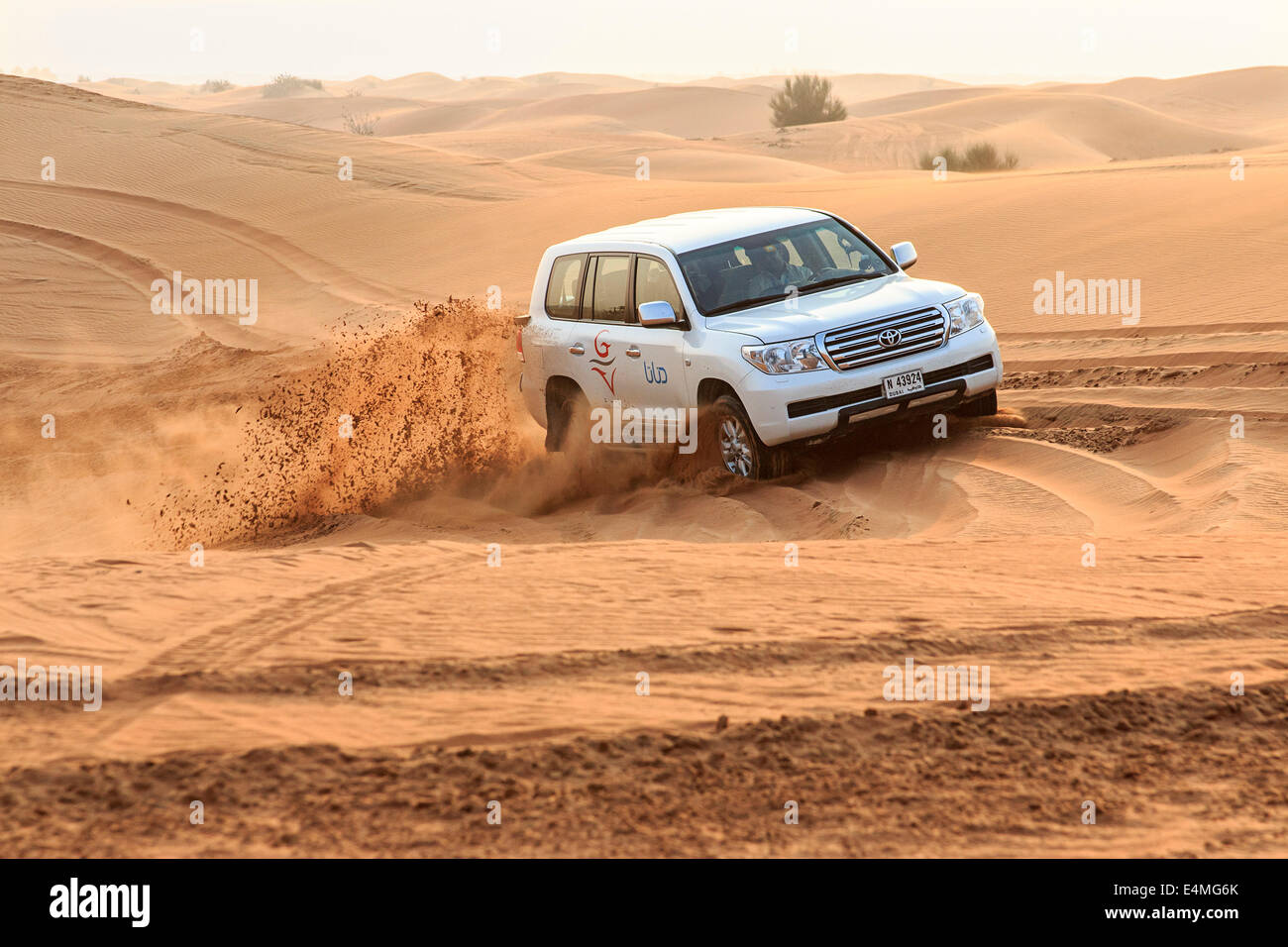 Dune bashing among the sand dunes outside Dubai, UAE Stock Photo - Alamy