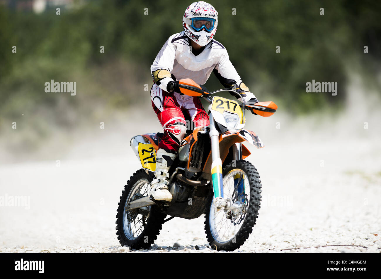 Man Riding Enduro Bike on Stony Trail Stock Photo - Alamy