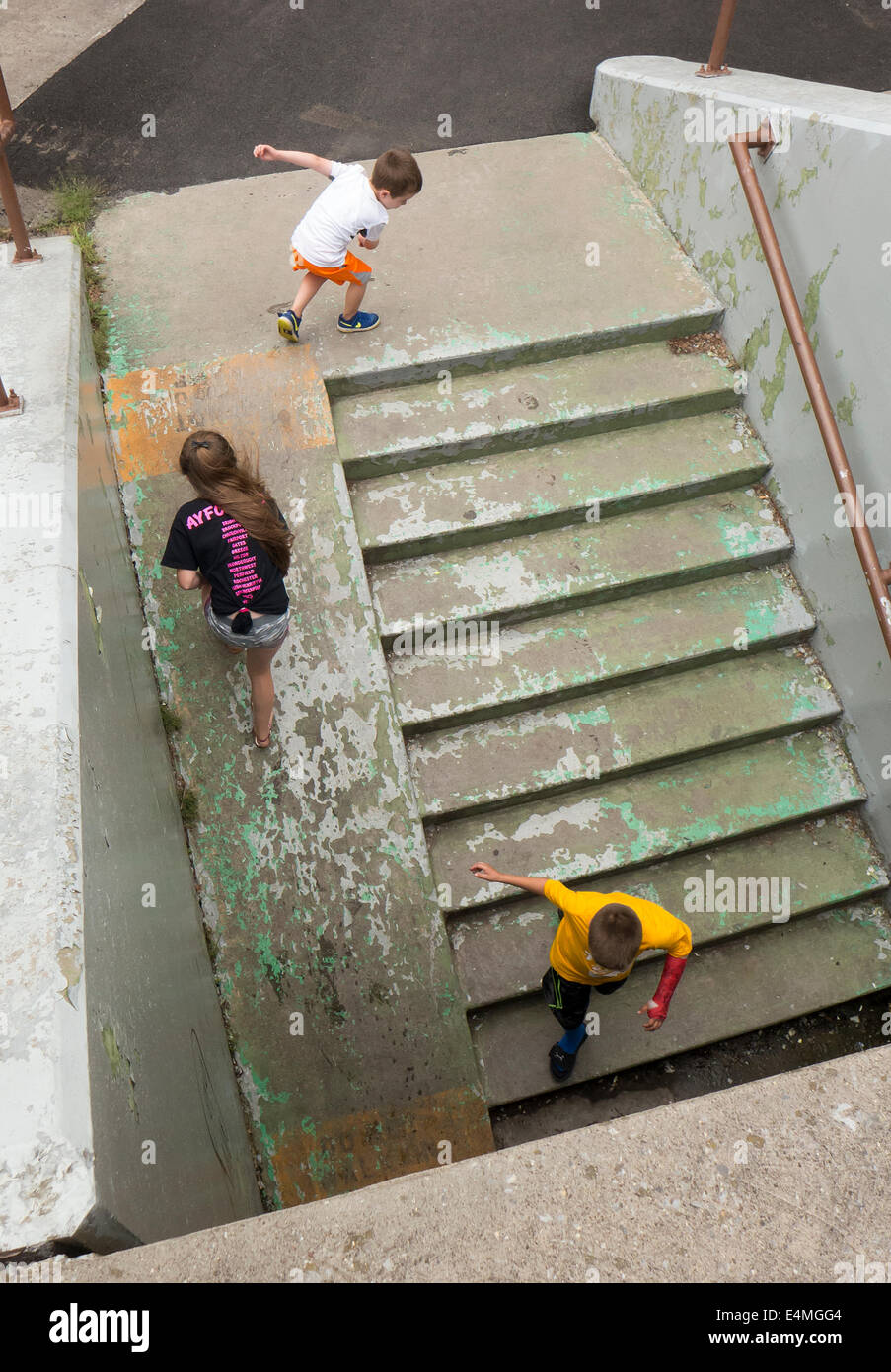 Children playing on stairs Stock Photo - Alamy