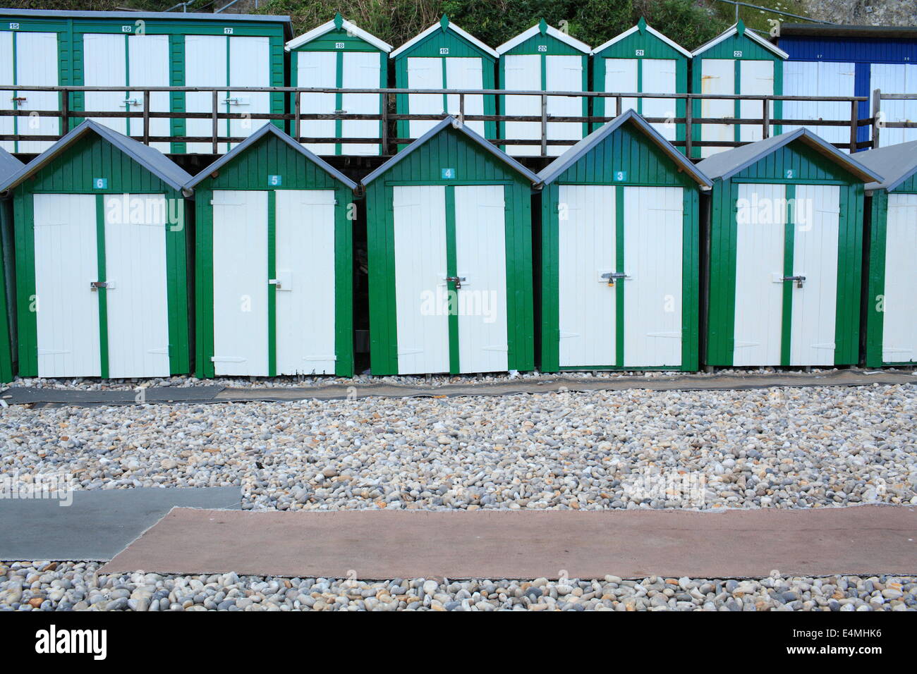 Two tier beach huts, Beer, East Devon, England, UK Stock Photo - Alamy