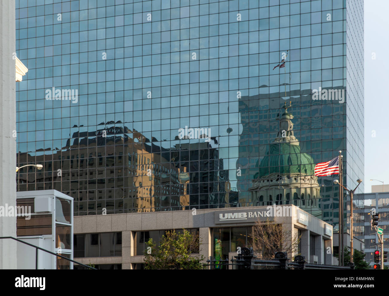 Reflections in a tall skyscraper building of the St Louis green domed ...