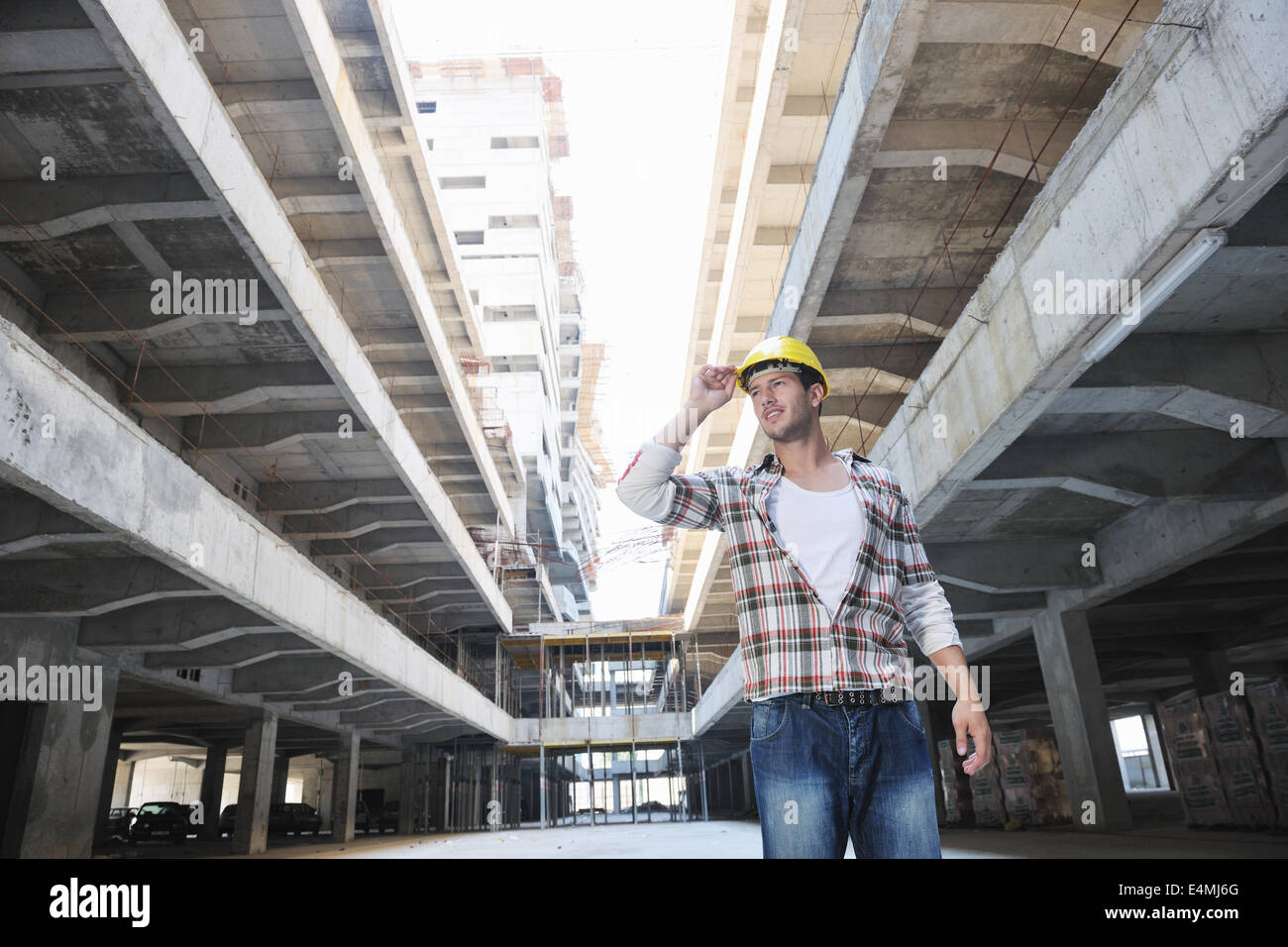 hard worker on construction site Stock Photo - Alamy