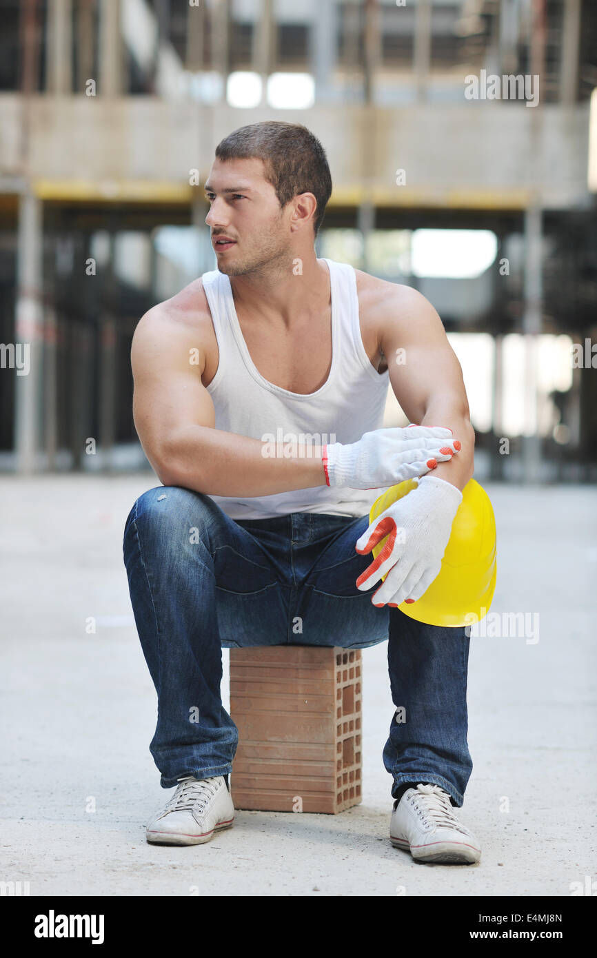 hard worker on construction site Stock Photo - Alamy