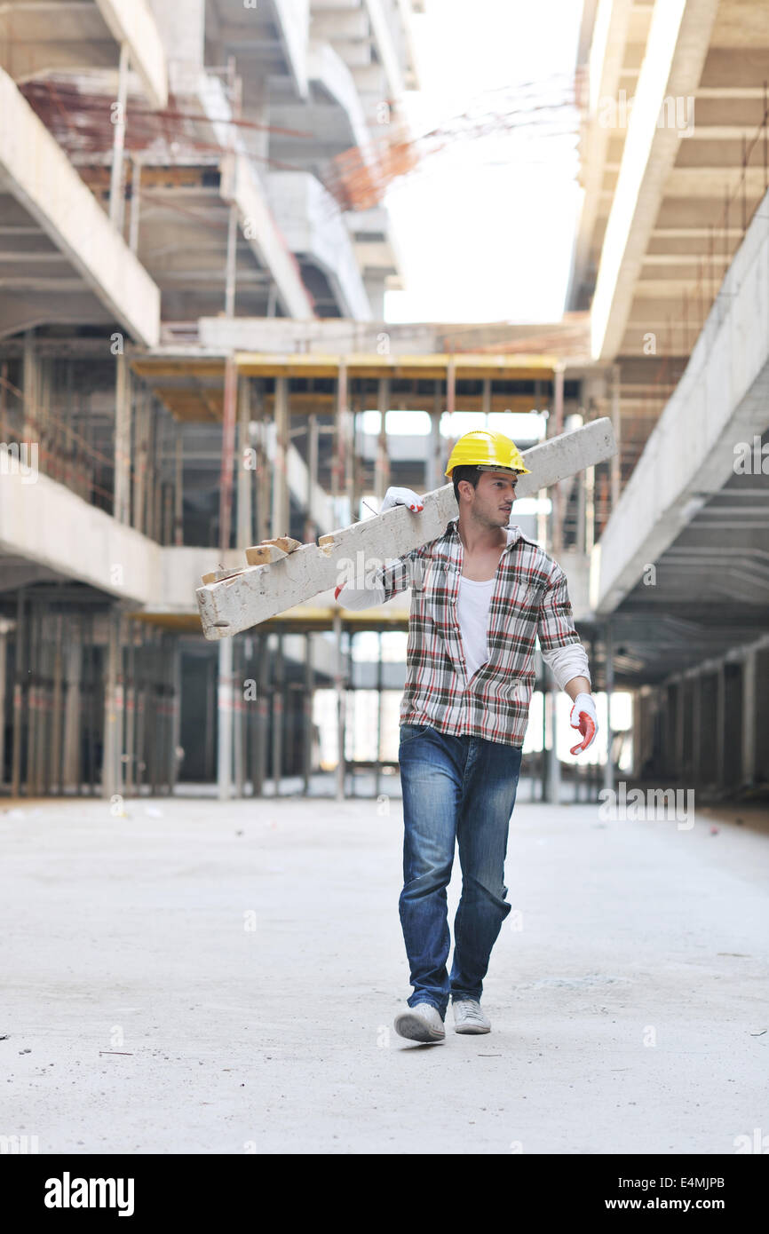 hard worker on construction site Stock Photo - Alamy