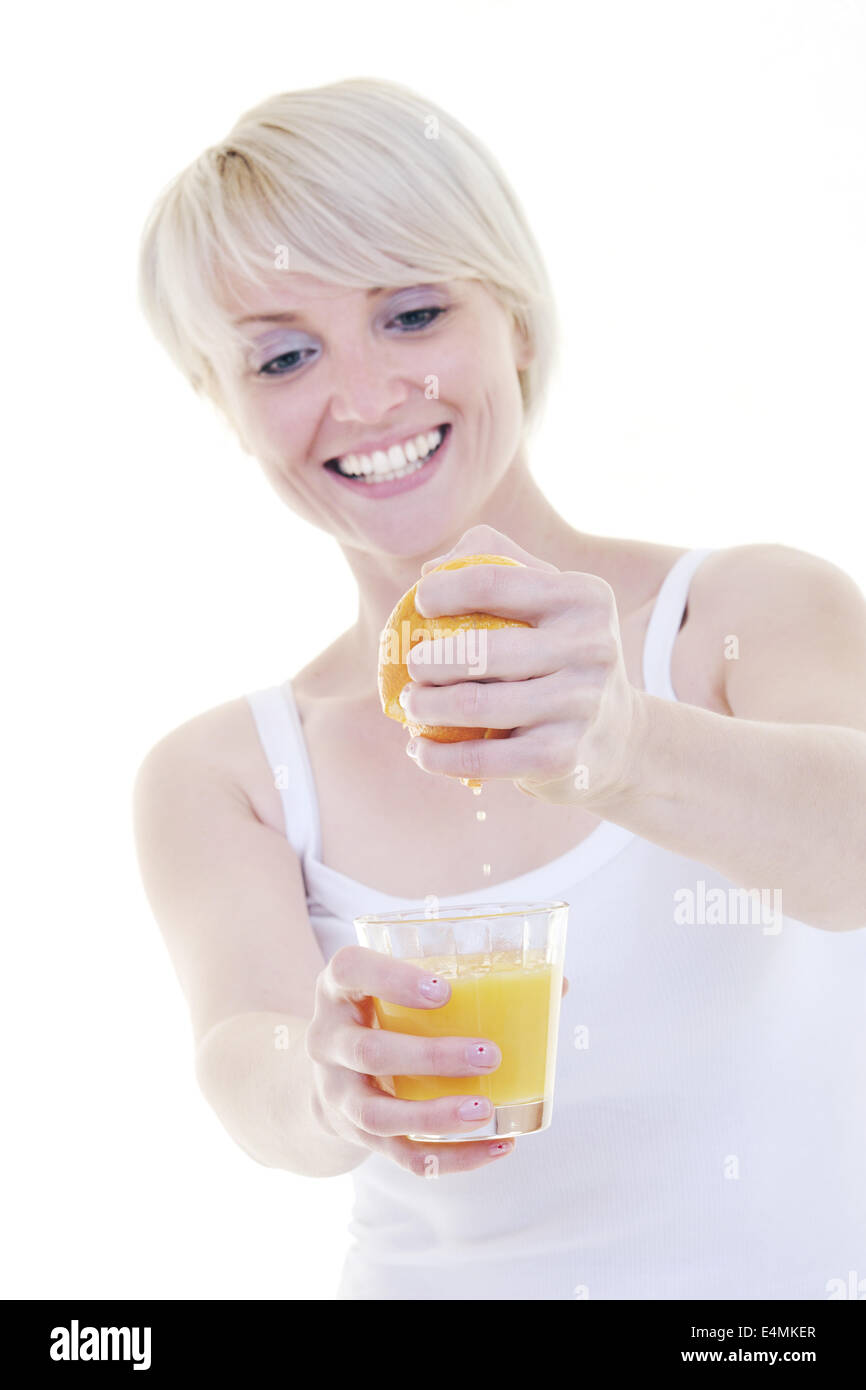 Young woman squeeze orange juice Stock Photo - Alamy