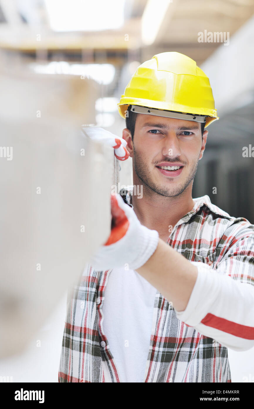 hard worker on construction site Stock Photo - Alamy
