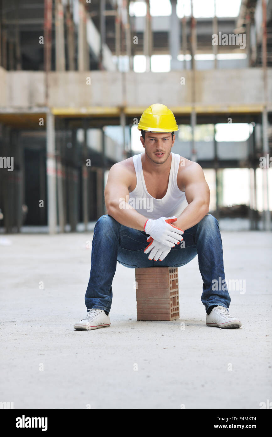 hard worker on construction site Stock Photo - Alamy