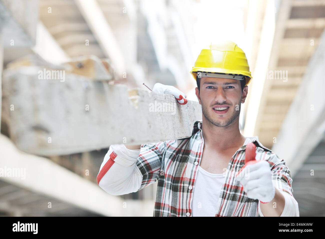 hard worker on construction site Stock Photo - Alamy
