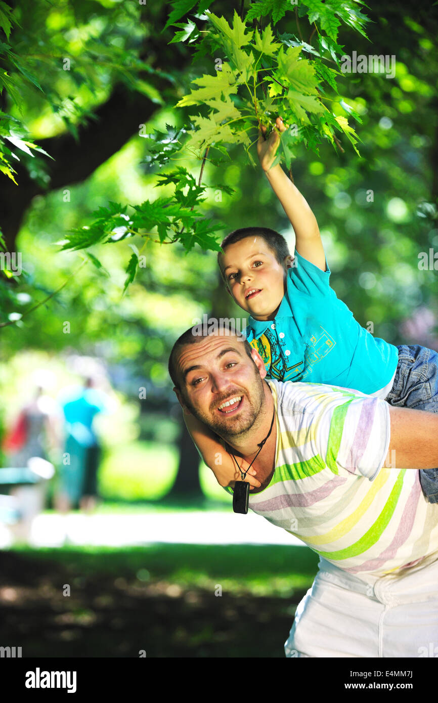 happy father and son have fun at park Stock Photo - Alamy
