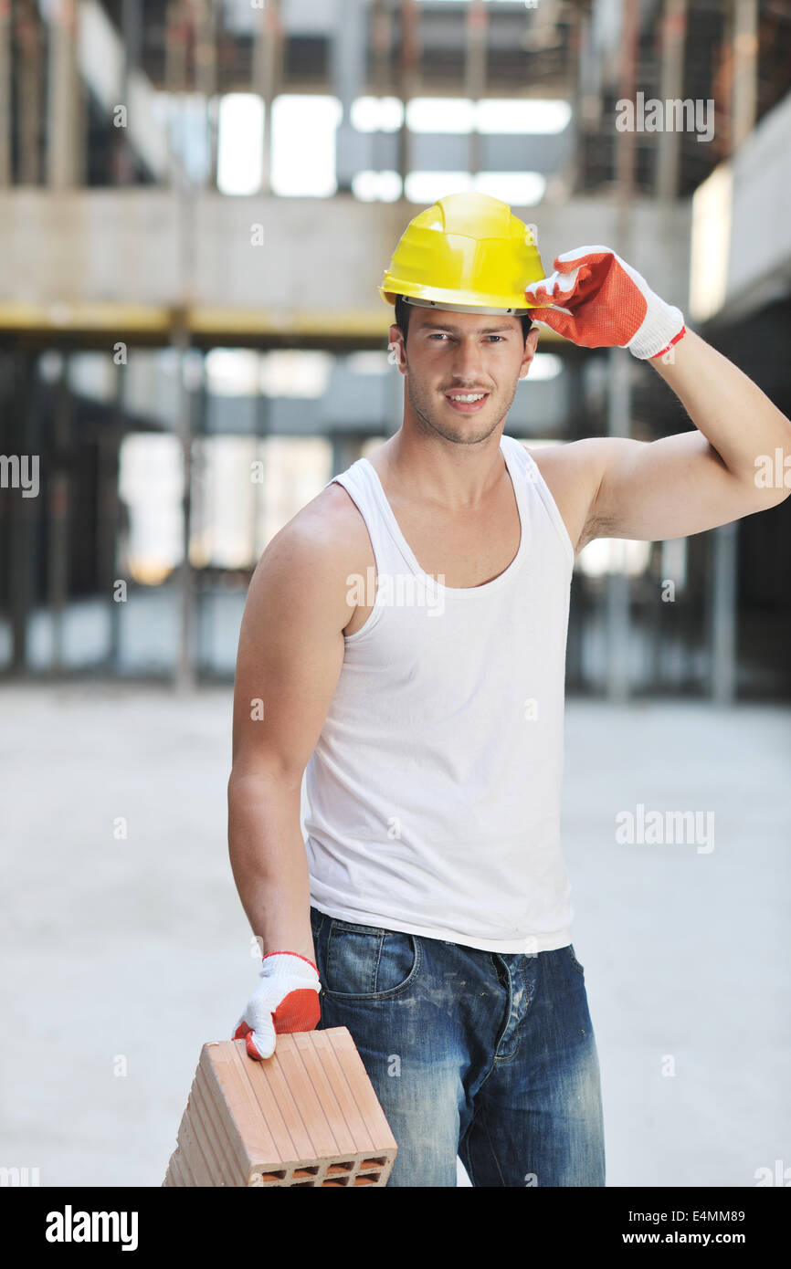 hard worker on construction site Stock Photo - Alamy