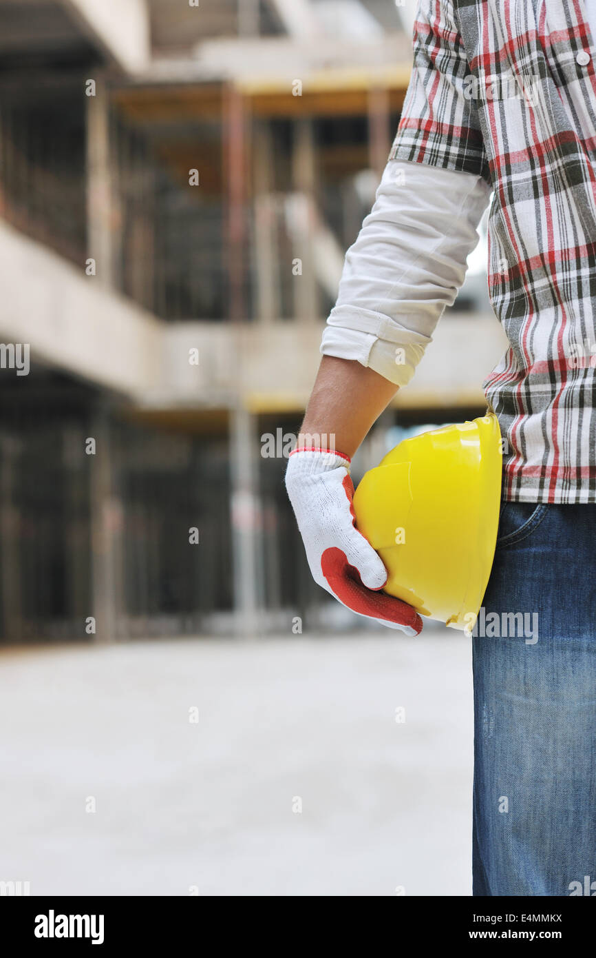 hard worker on construction site Stock Photo - Alamy