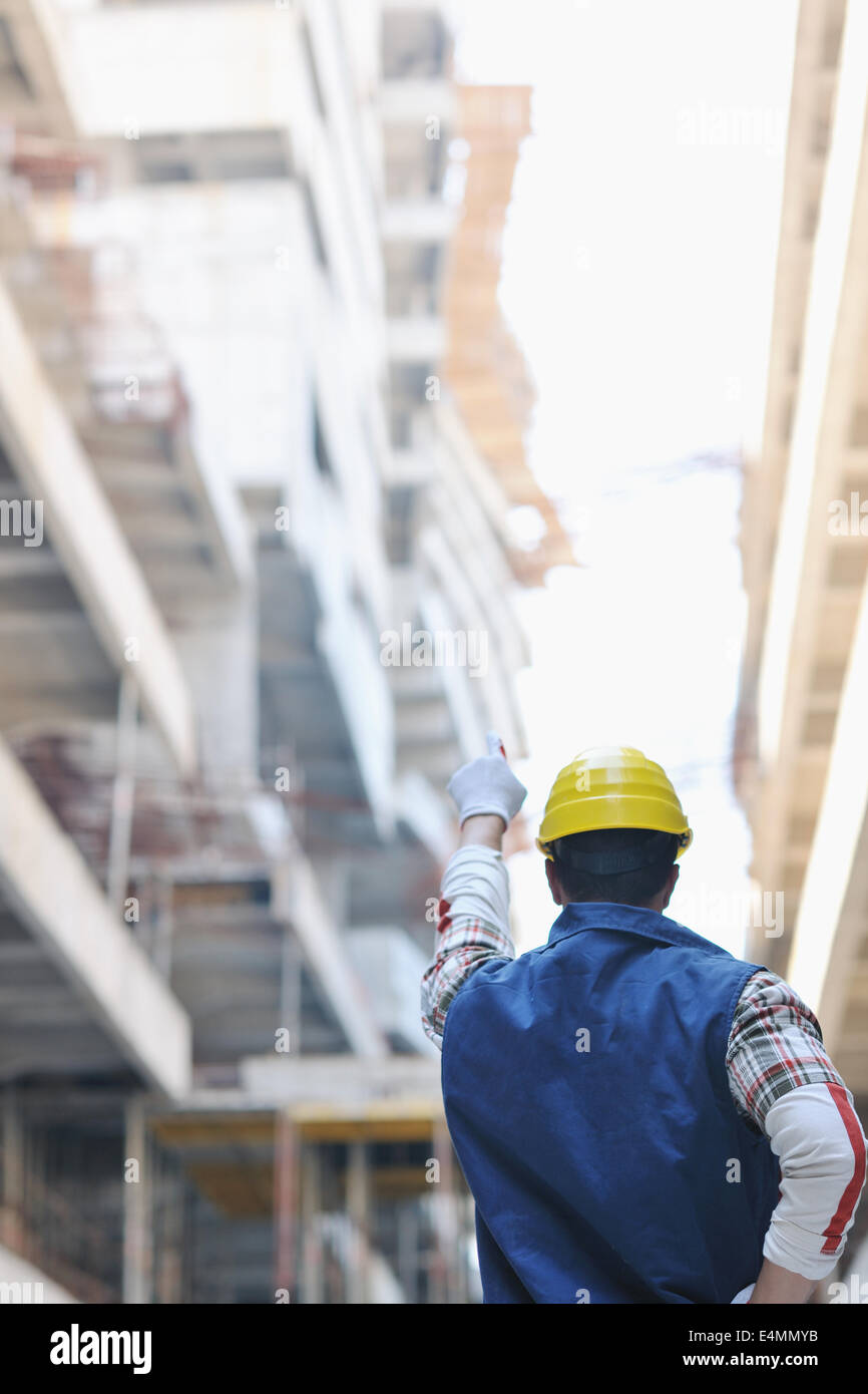 hard worker on construction site Stock Photo - Alamy