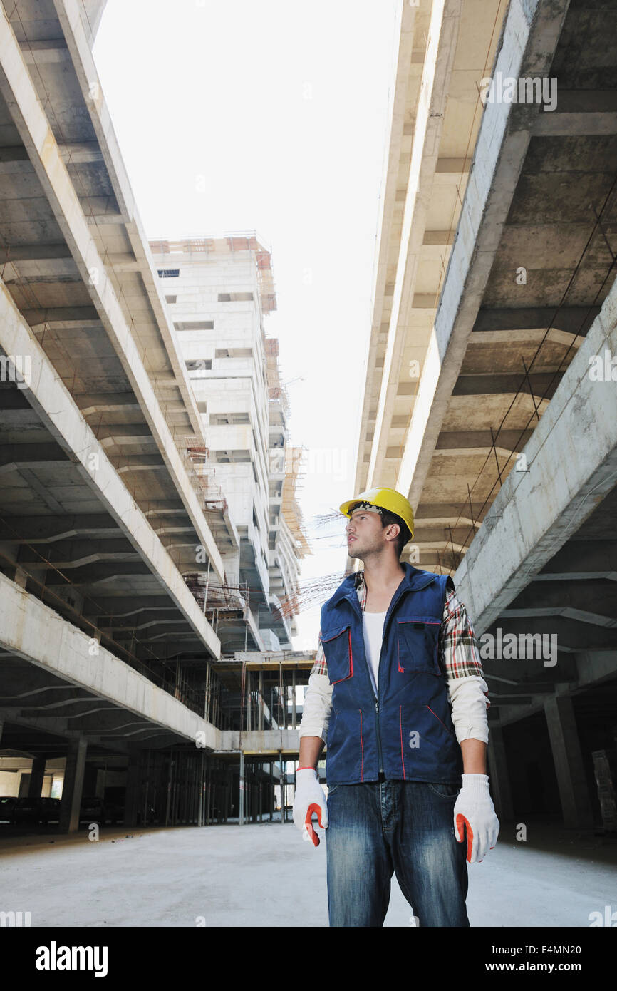 hard worker on construction site Stock Photo - Alamy