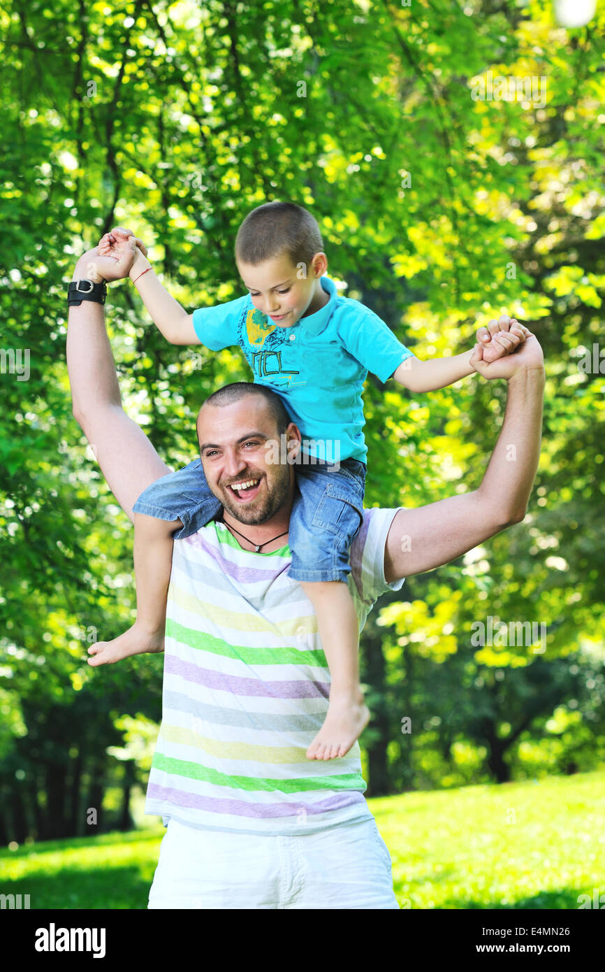 happy father and son have fun at park Stock Photo - Alamy