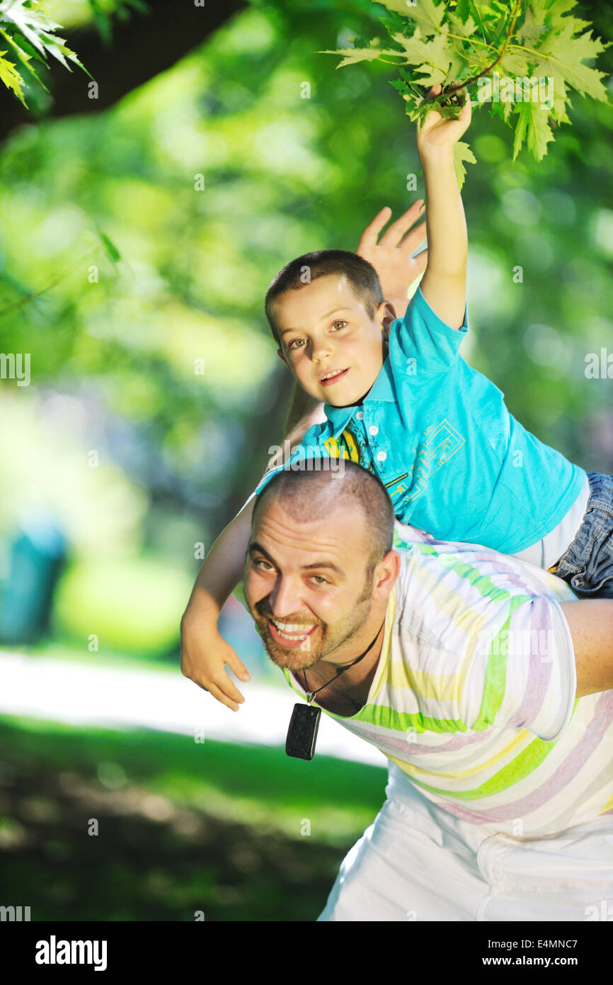 happy father and son have fun at park Stock Photo - Alamy
