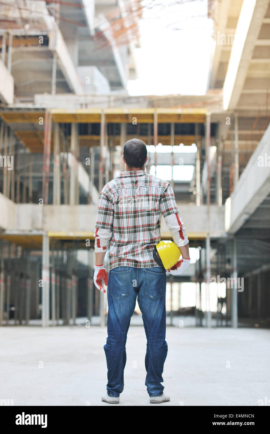 hard worker on construction site Stock Photo - Alamy