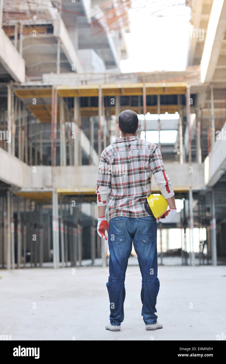 hard worker on construction site Stock Photo - Alamy