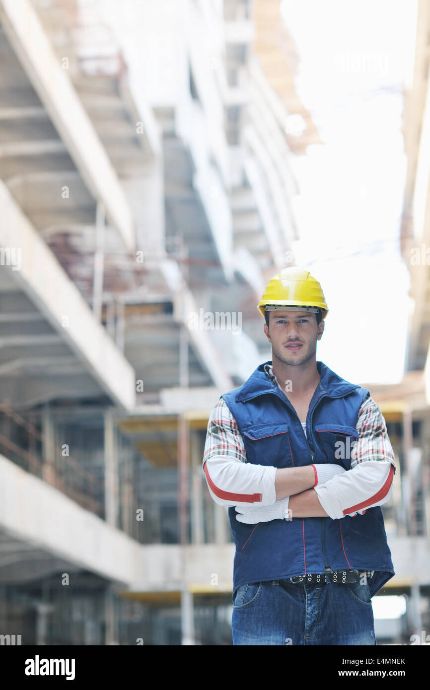 hard worker on construction site Stock Photo - Alamy