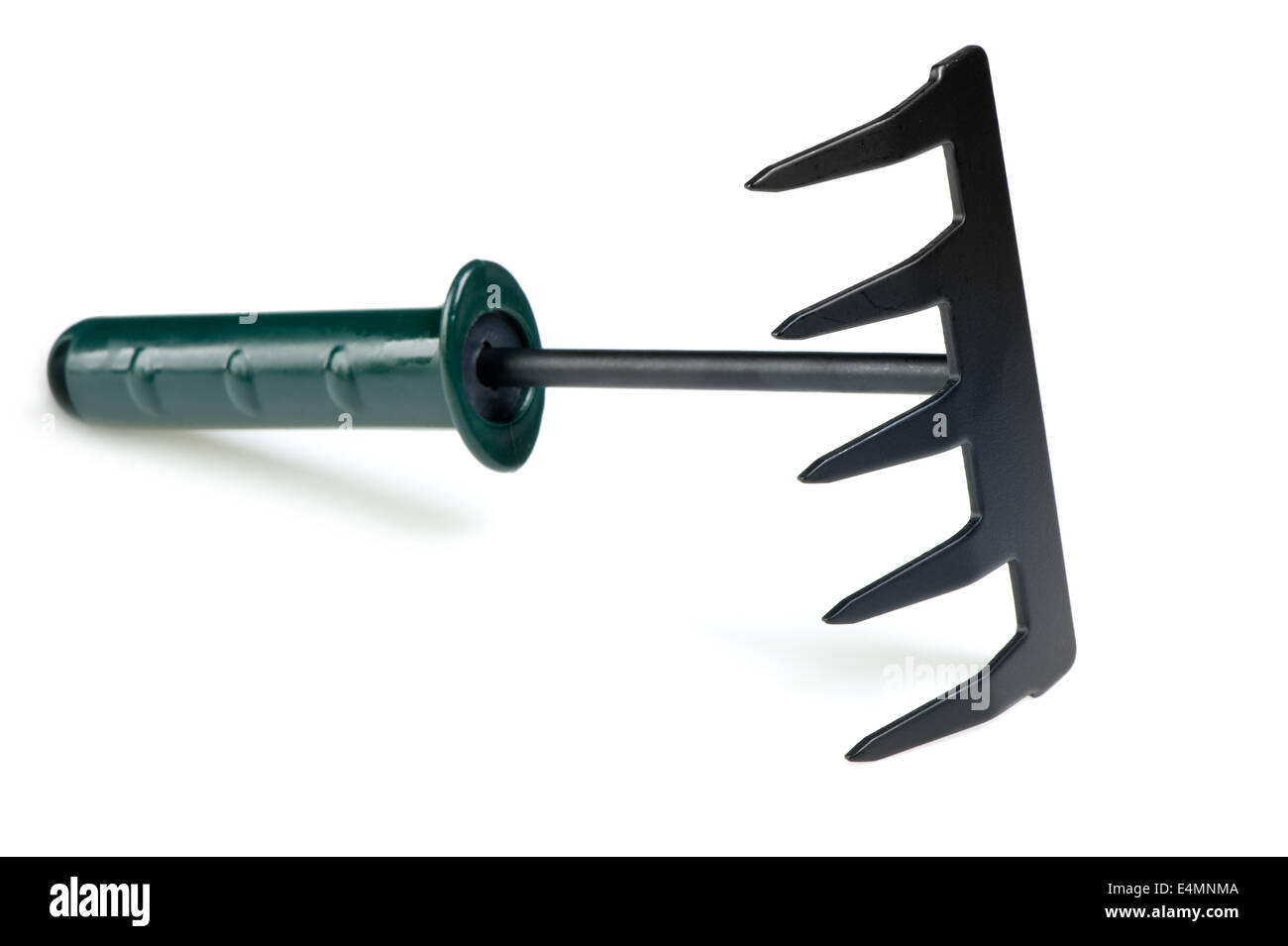 The garden tool a rake Stock Photo - Alamy
