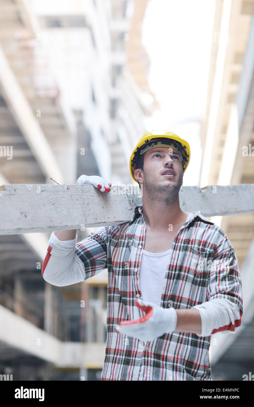 hard worker on construction site Stock Photo - Alamy
