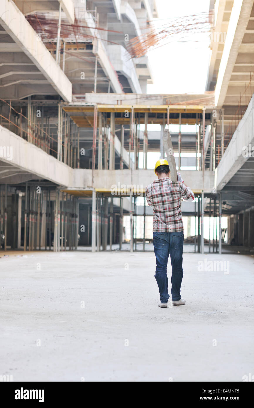 hard worker on construction site Stock Photo - Alamy