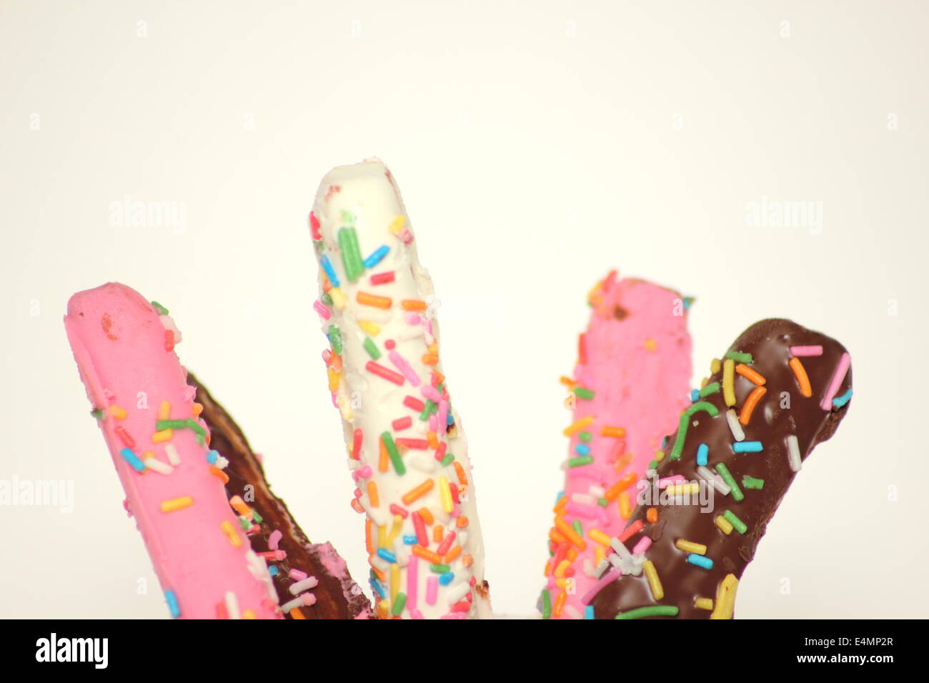 Choc candy coated chocolate on white background Stock Photo - Alamy