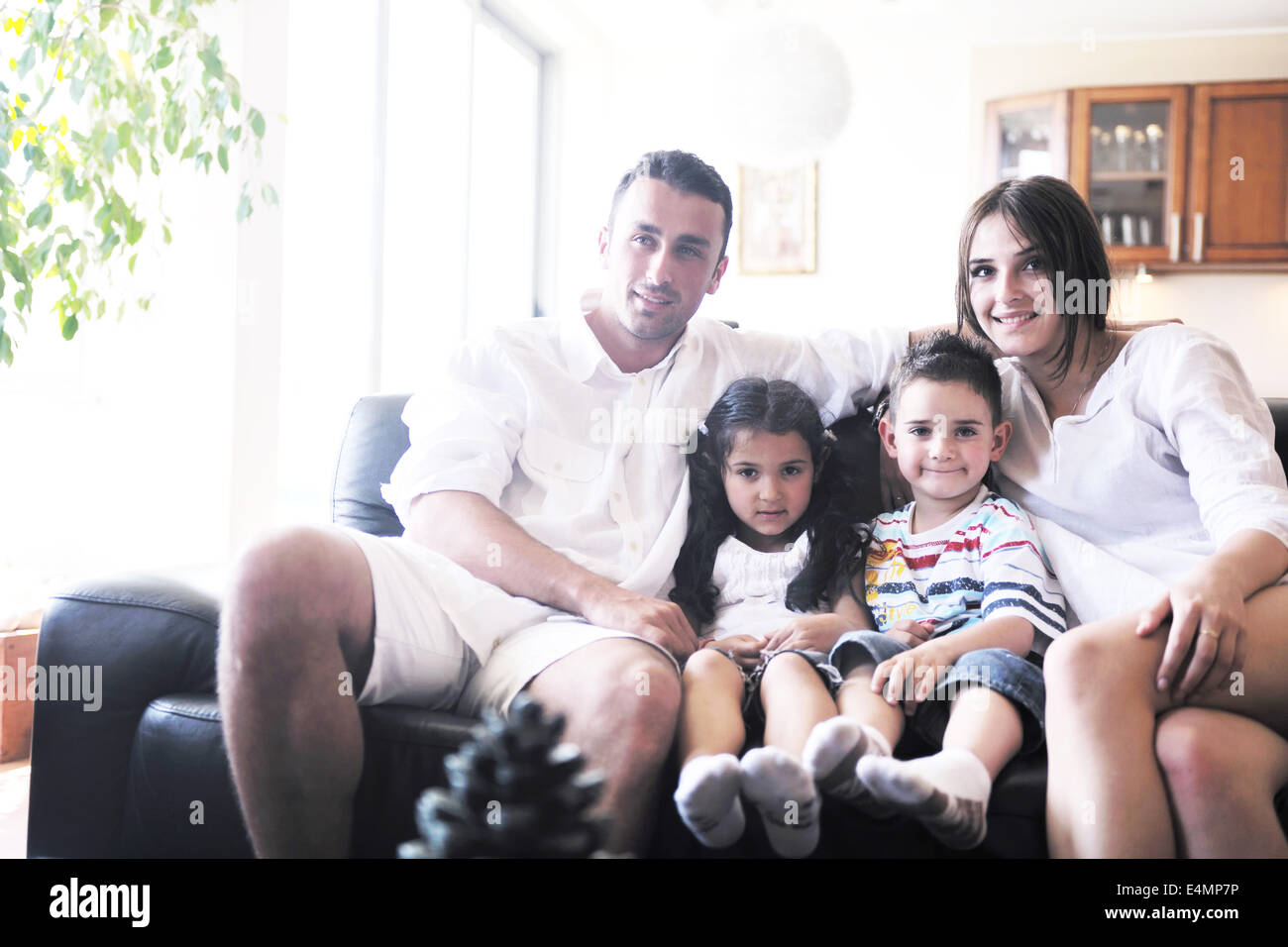 young family at home Stock Photo - Alamy