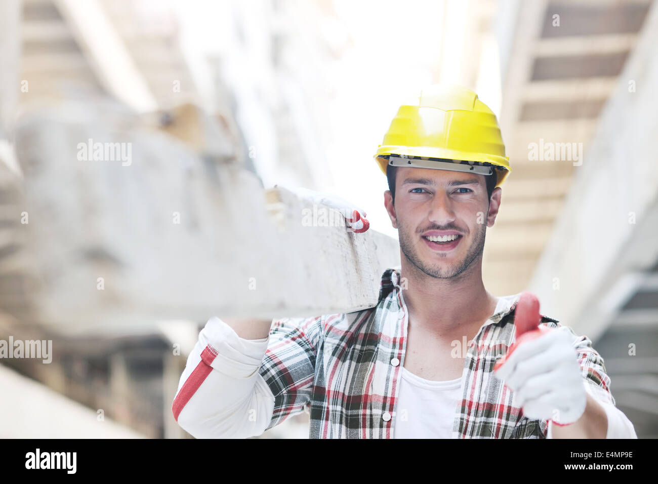 hard worker on construction site Stock Photo - Alamy