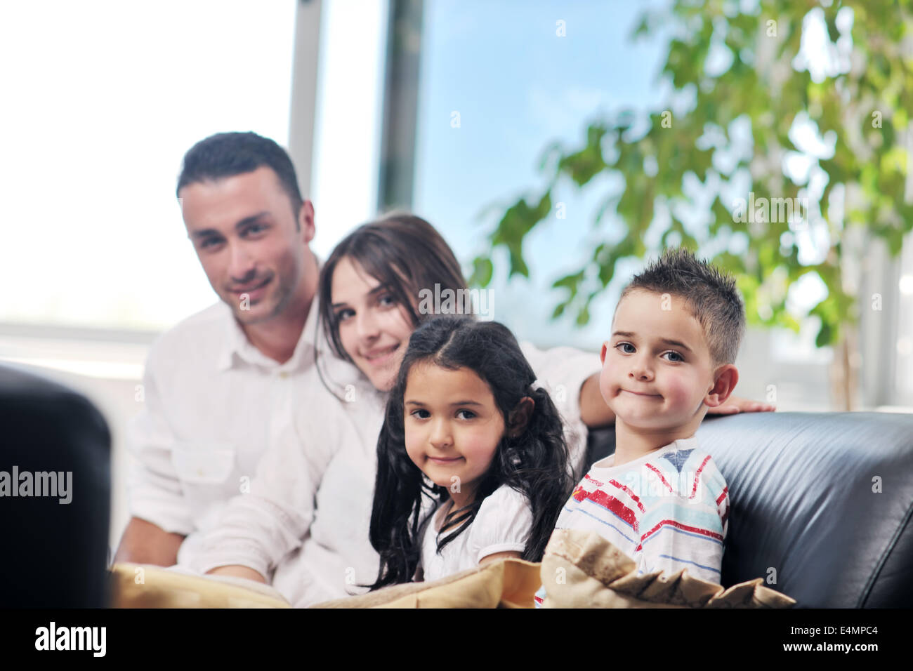 young family at home Stock Photo - Alamy