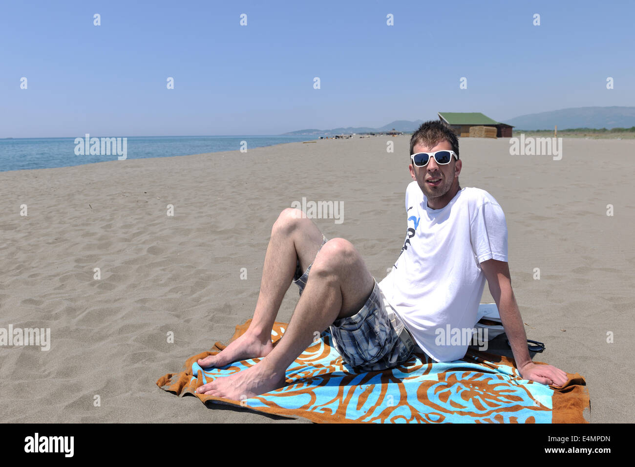 man relax on beach Stock Photo - Alamy