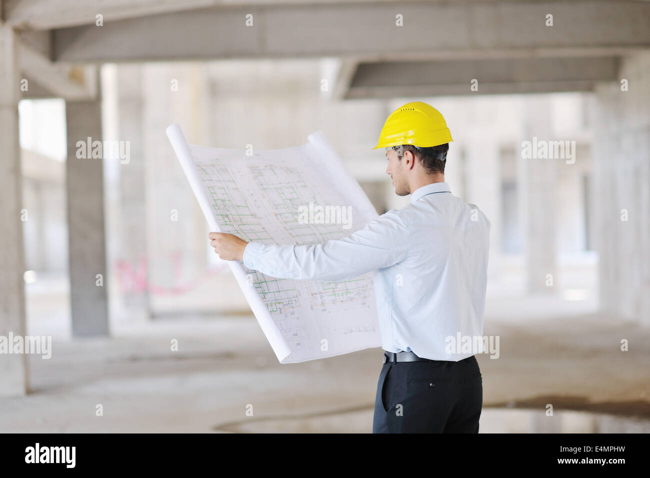 architect on construction site Stock Photo - Alamy