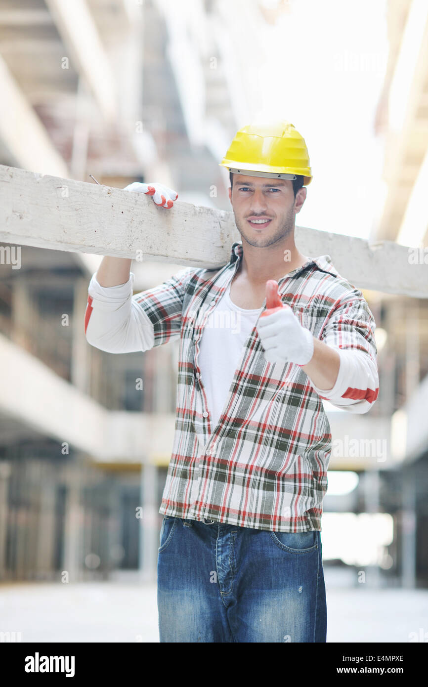 hard worker on construction site Stock Photo - Alamy