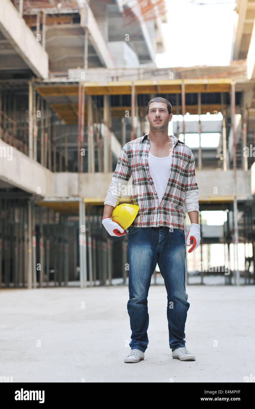 hard worker on construction site Stock Photo - Alamy
