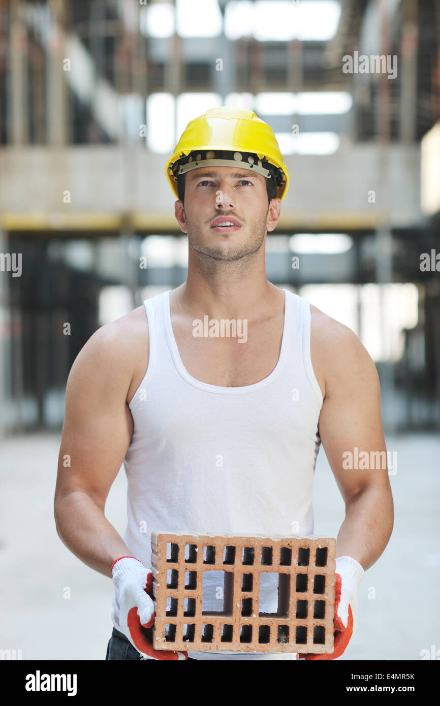 hard worker on construction site Stock Photo - Alamy