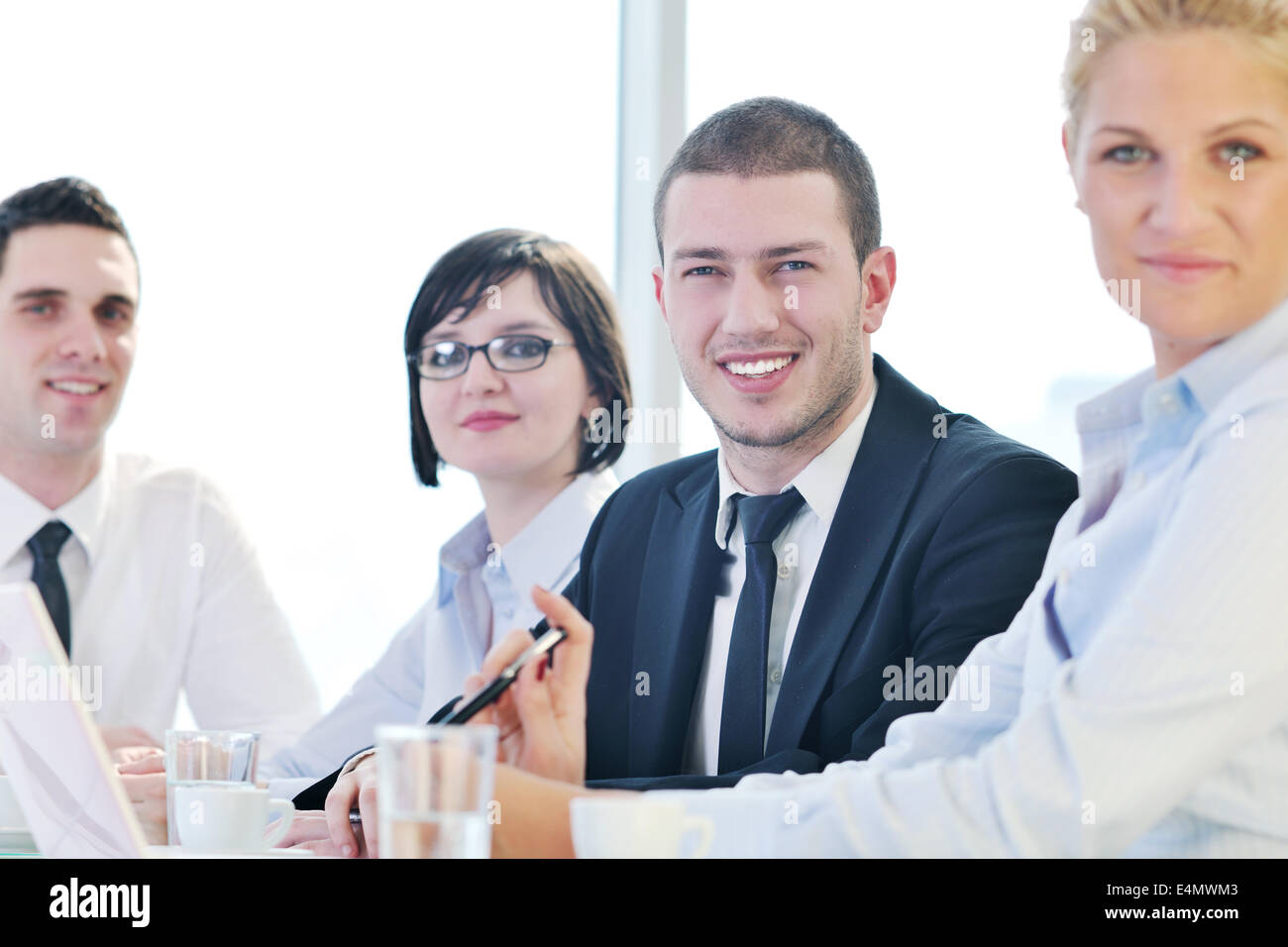 group of business people at meeting Stock Photo - Alamy