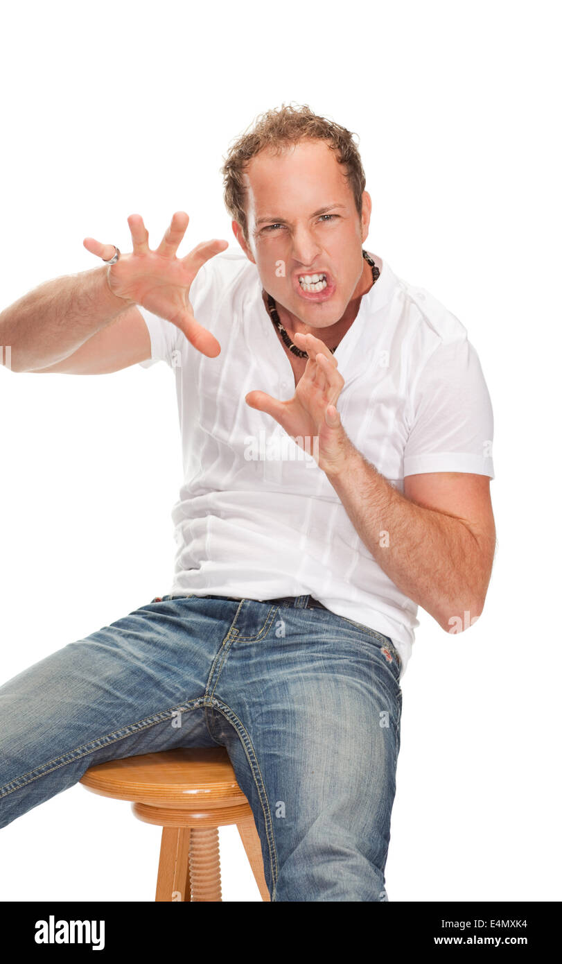 Portrait of young surprised man gesturing Stock Photo - Alamy