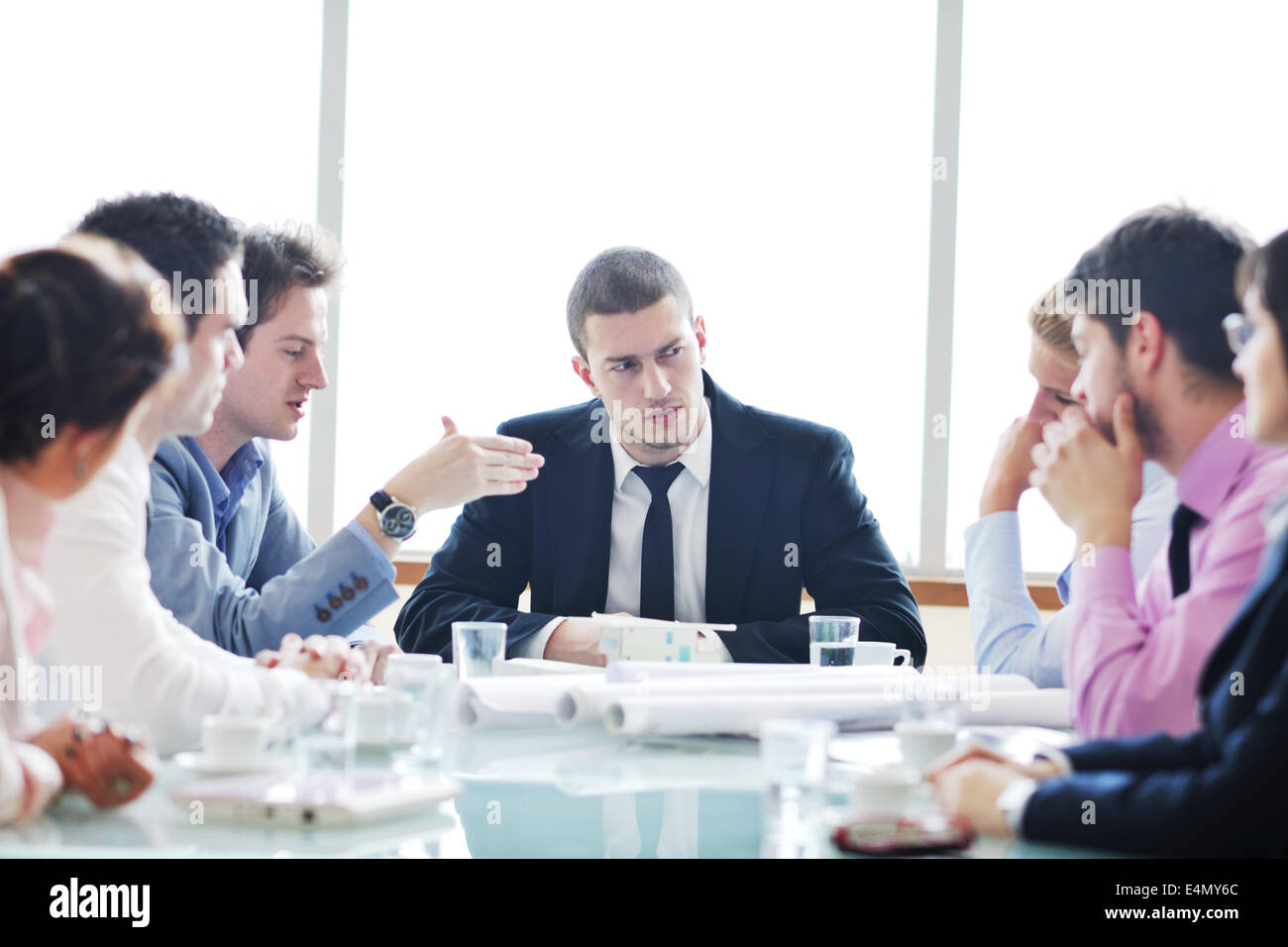 group of business people at meeting Stock Photo - Alamy