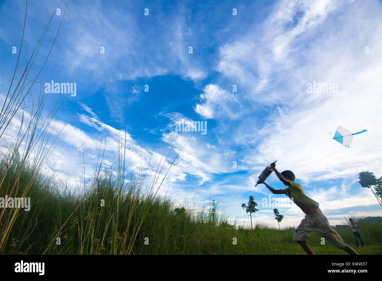children are playing with kite Stock Photo - Alamy