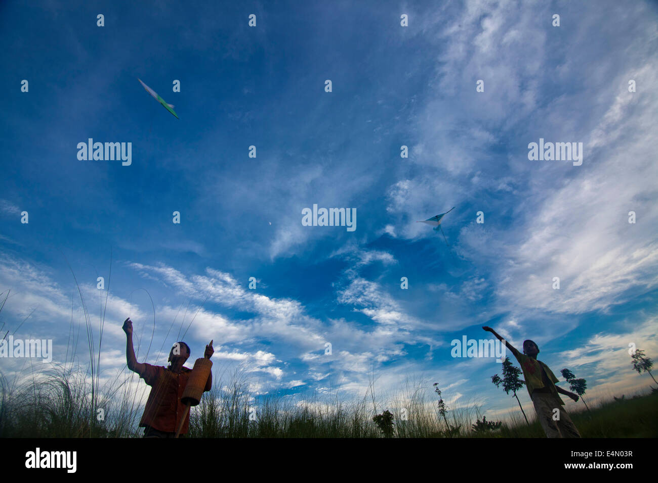 children are playing with kite Stock Photo - Alamy