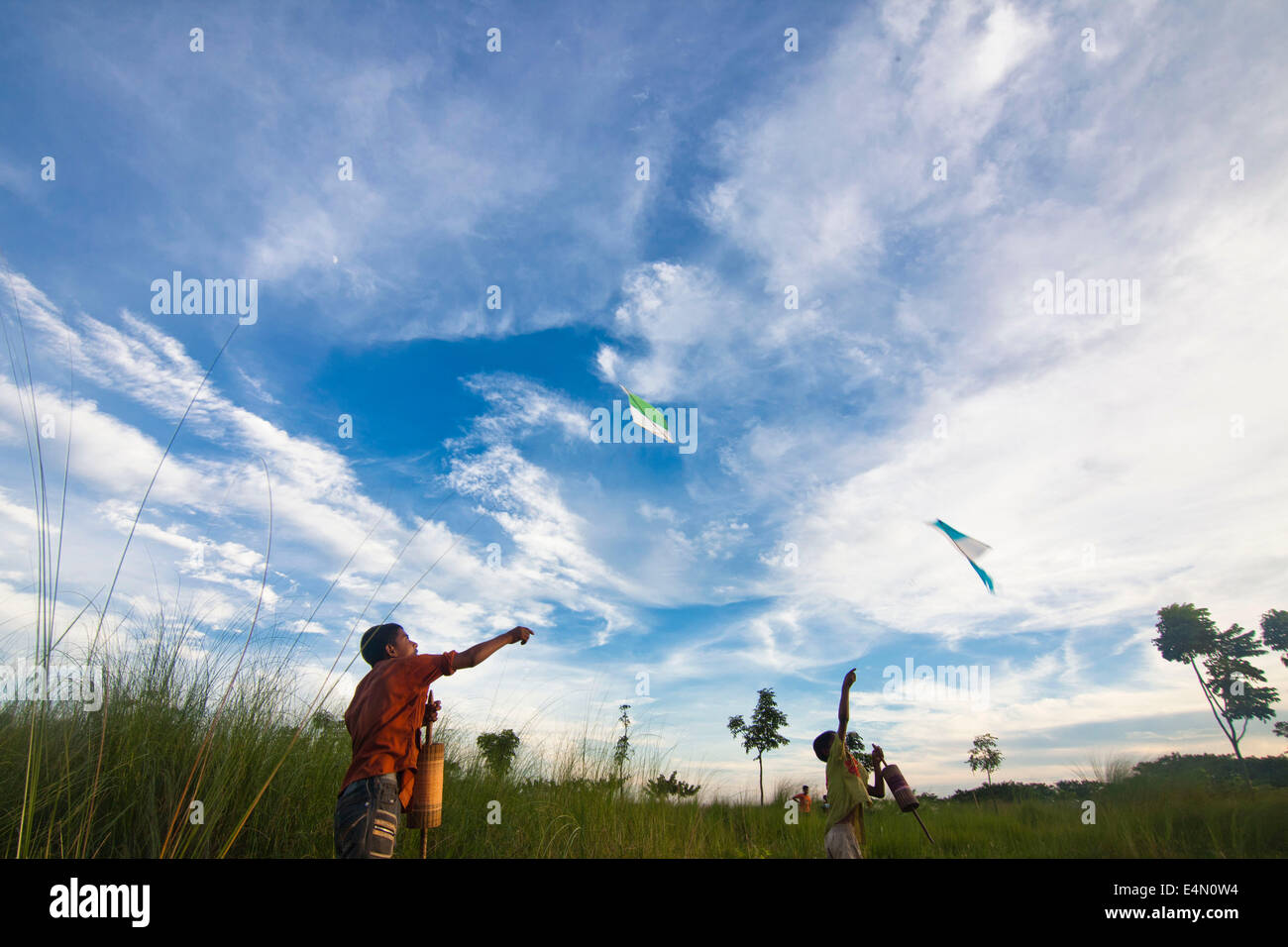 children are playing with kite Stock Photo - Alamy