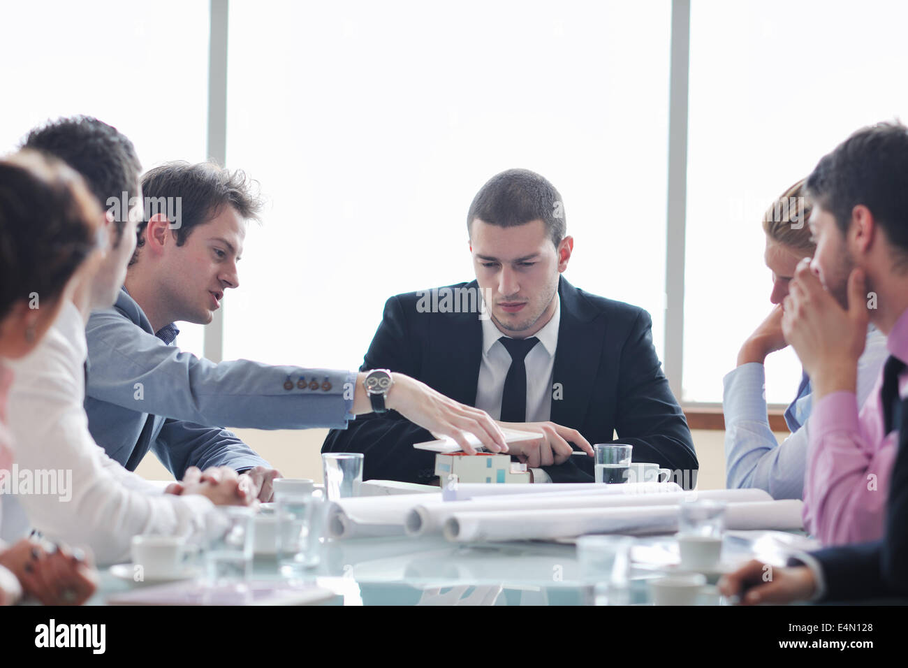 group of business people at meeting Stock Photo - Alamy
