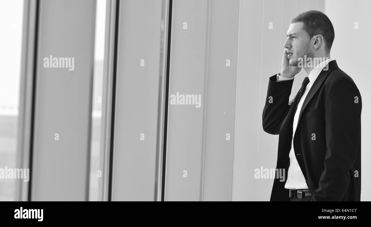 Confident businessman mobile phone Black and White Stock Photos ...