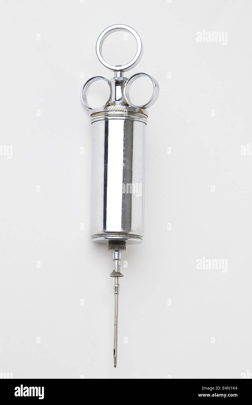 Metal syringe hi-res stock photography and images - Alamy