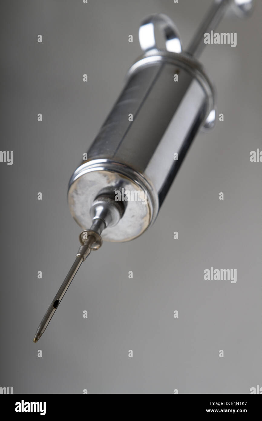 Metal syringe hi-res stock photography and images - Alamy